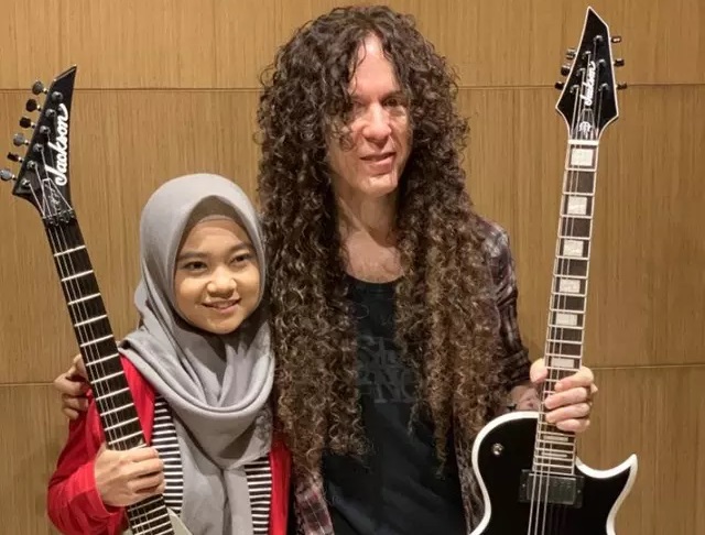 4 Fakta Tentang Meliani, Gitaris Metal Hijaber Yang Dipuji Megadeth ...
